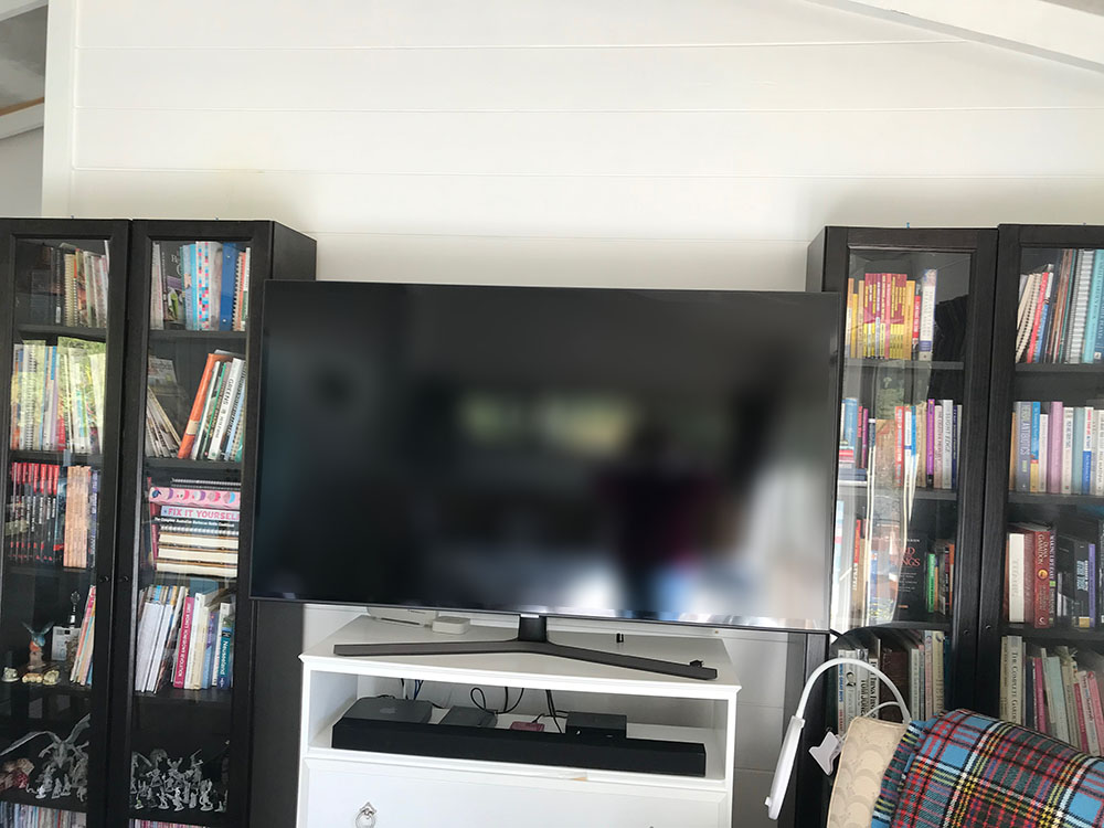 Bookcase with tv in middle store